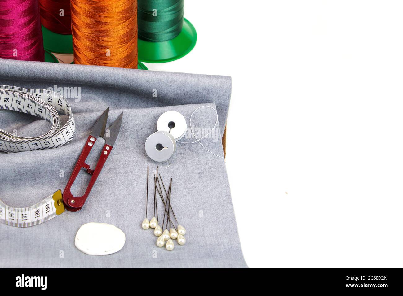 Pieces of cloth and thread. Tailoring, manufacture of upholstered ...