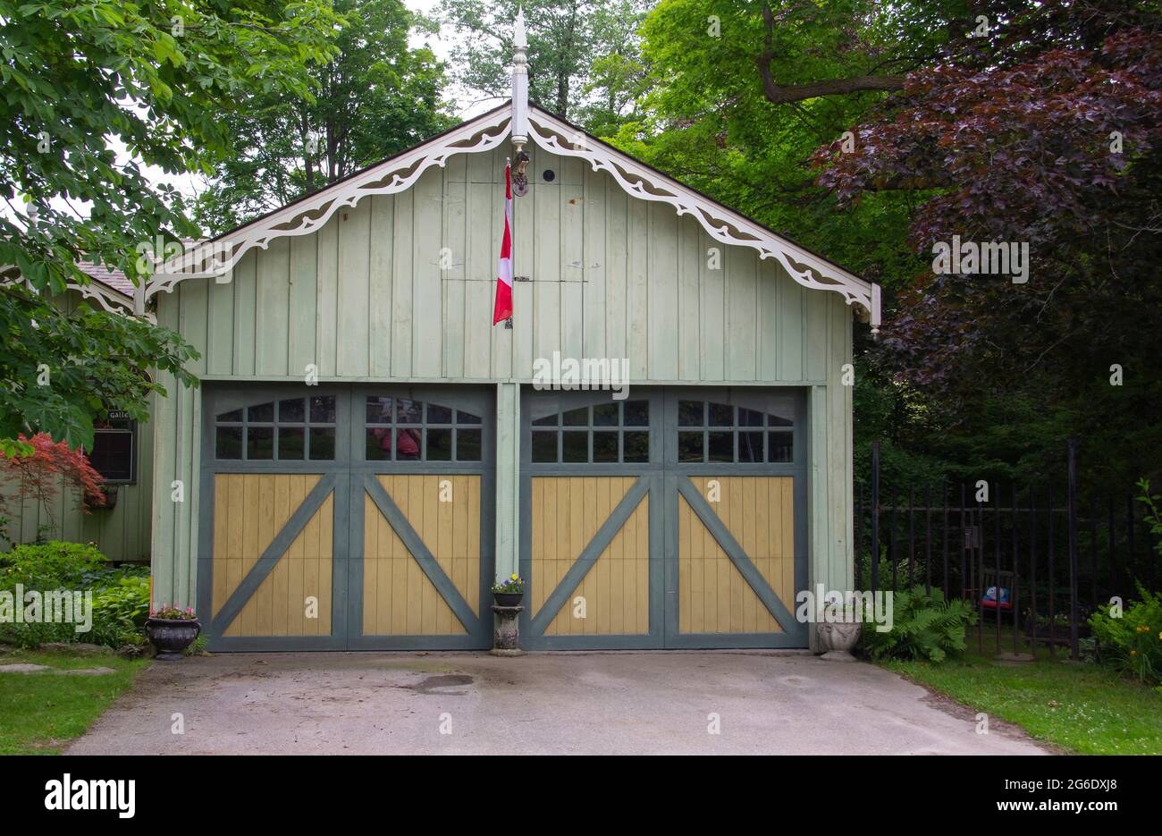 Quaint garage with Canadian flag Stock Photo - Alamy