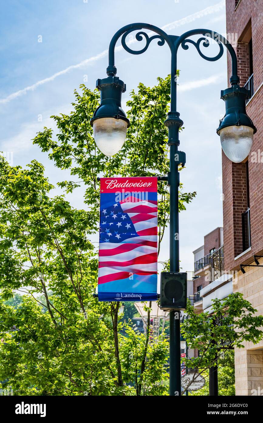 Branson, MO - June 9, 2021: Budweiser Banner on a lamp post at Branson ...