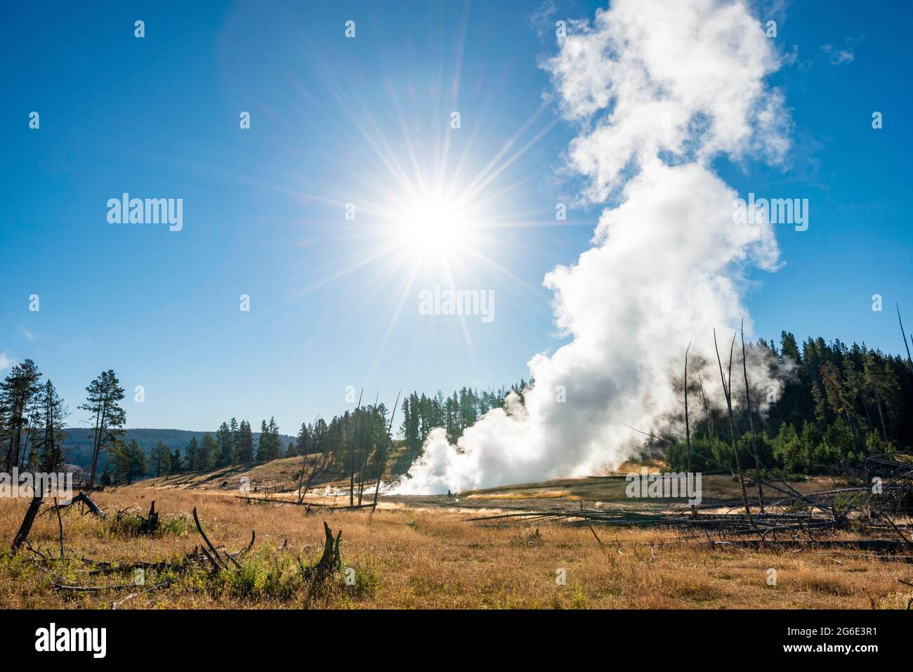 Steaming thermal spring, sun with sun star, Churning Caldron ...