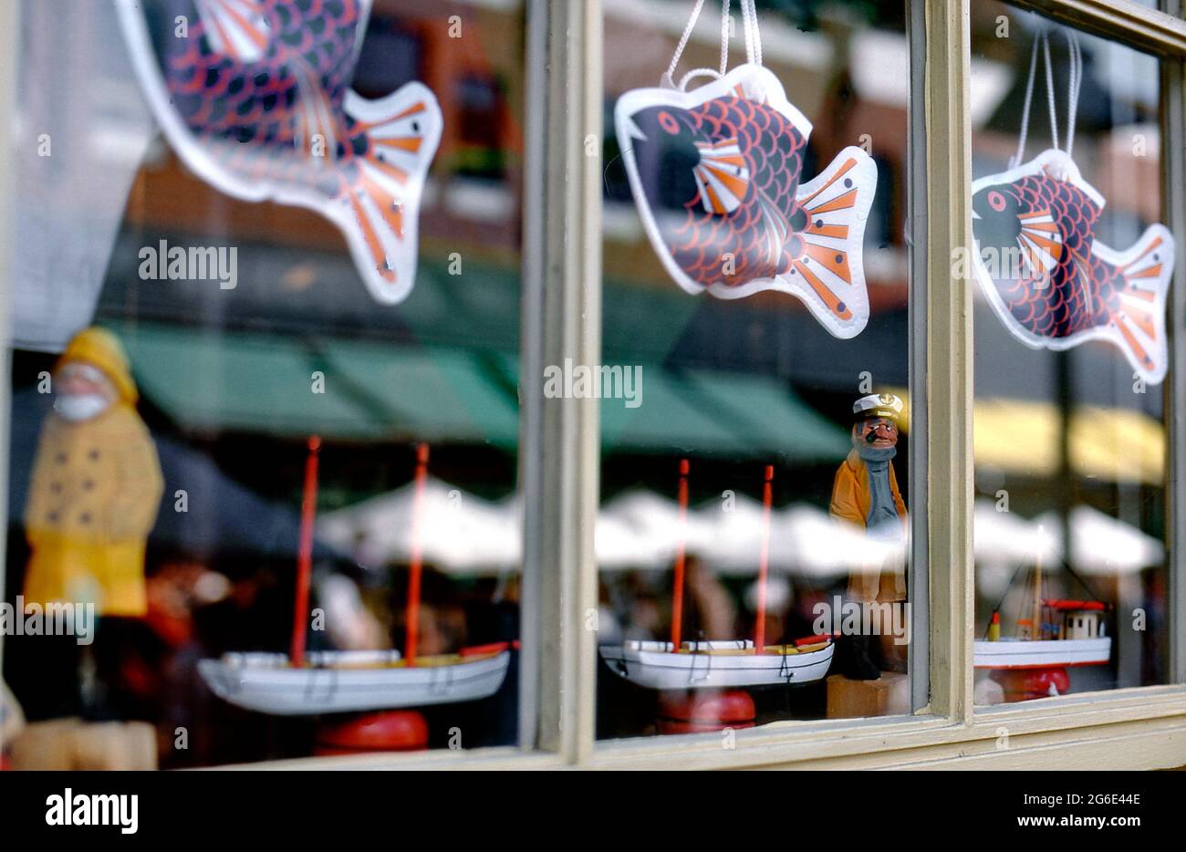 A vibrant gift shop display featuring red, white, and blue fish ...