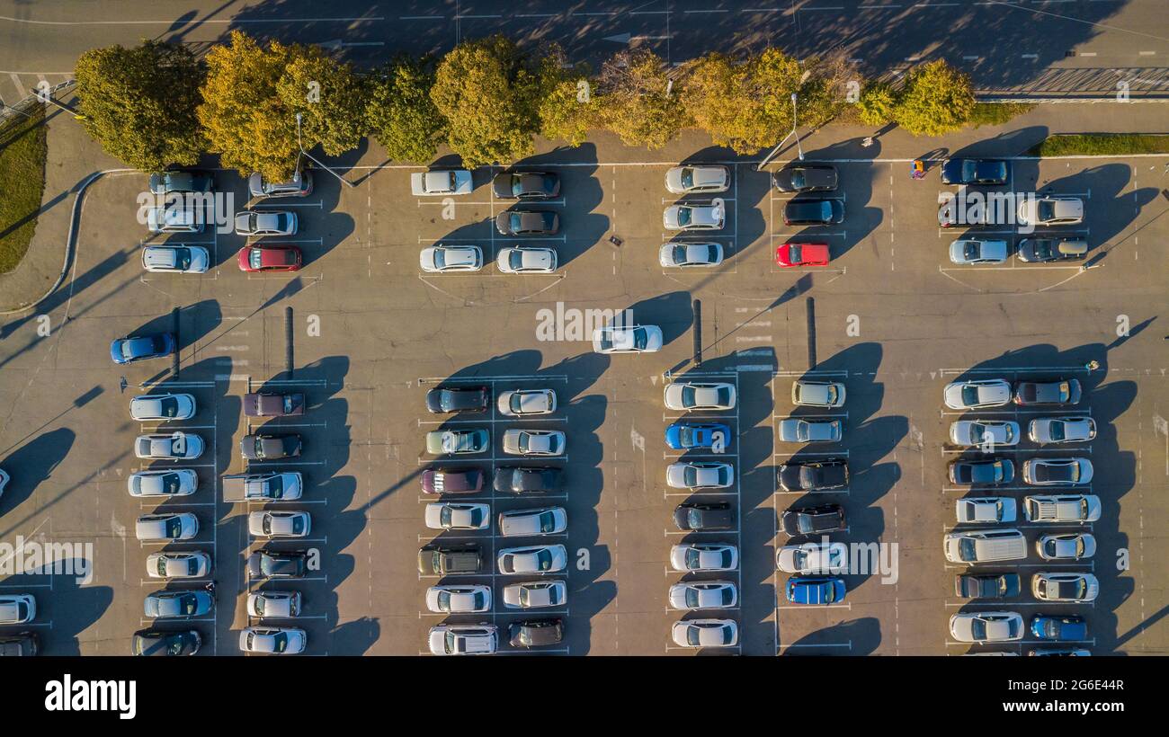 Parking with parked cars. Aerial view from a height Stock Photo - Alamy