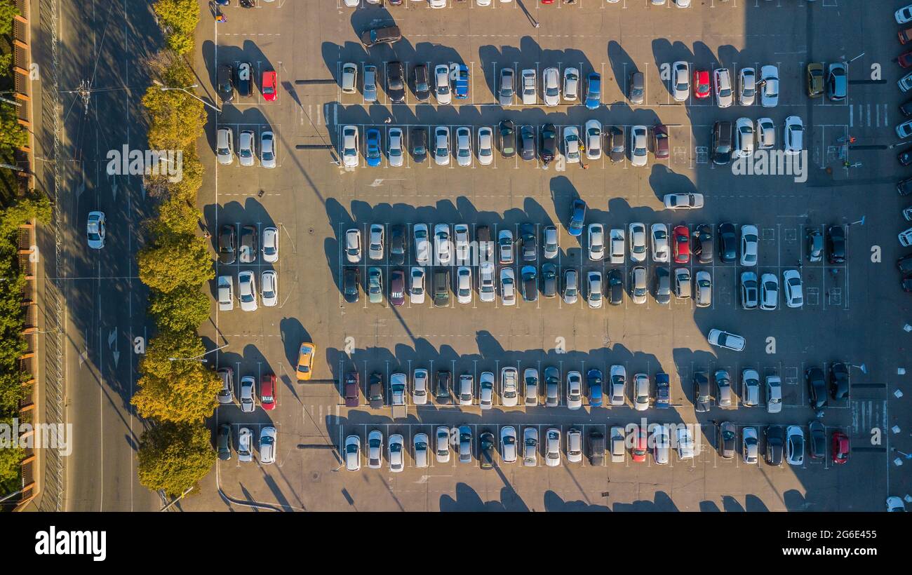 Parking with parked cars. Aerial view from a height Stock Photo - Alamy