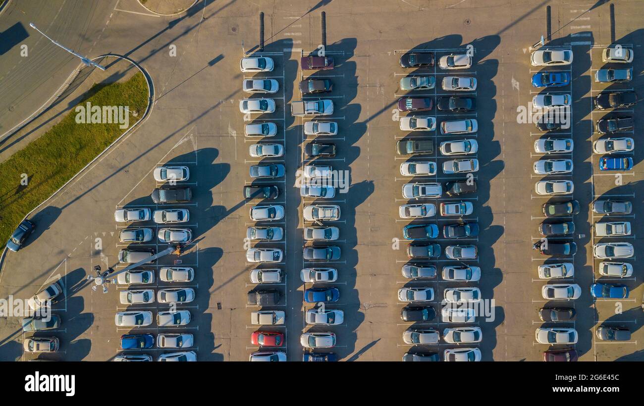 Parking with parked cars. Aerial view from a height Stock Photo - Alamy