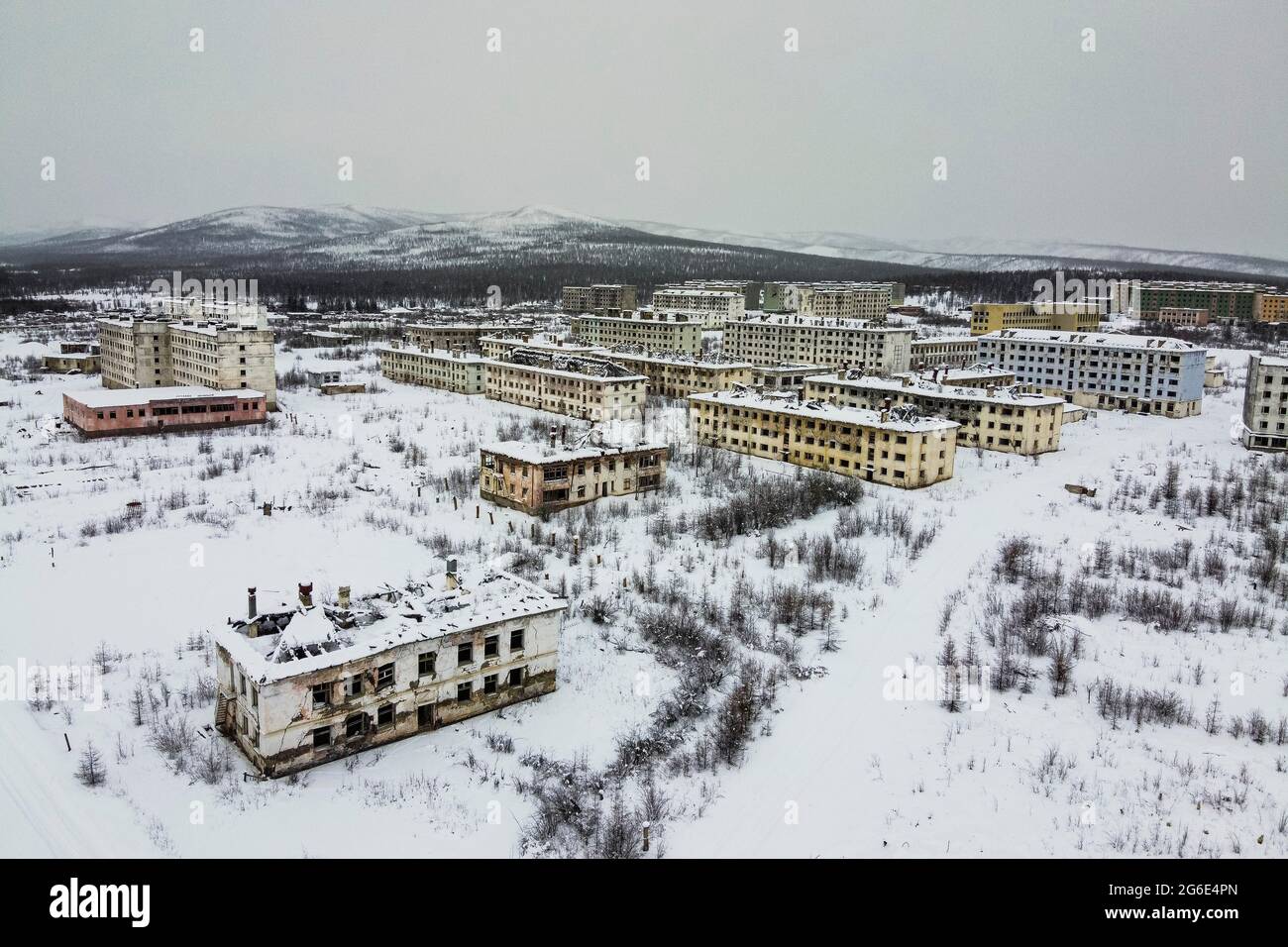 Aerial of the abandoned mining city Kadykchan, Road of Bones, Magadan ...