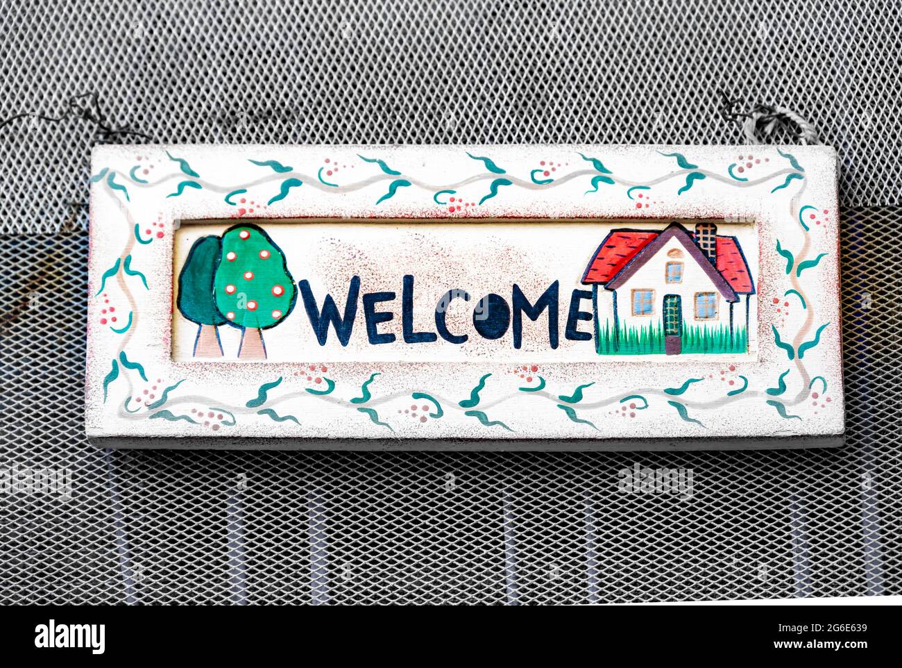 Welcome sign on a front door Stock Photo - Alamy