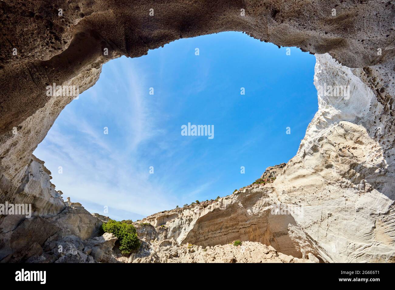 Cauldron-like rock walls of the collapsed cave Sykia, Milos, Cyclades ...