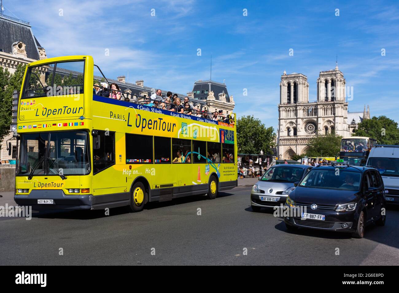 Sightseeing tour, bus, Notre-Dame Cathedral, Paris, France Stock Photo ...