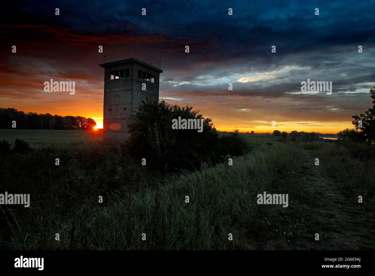Sunrise, observation tower of the border troops of the GDR, border ...