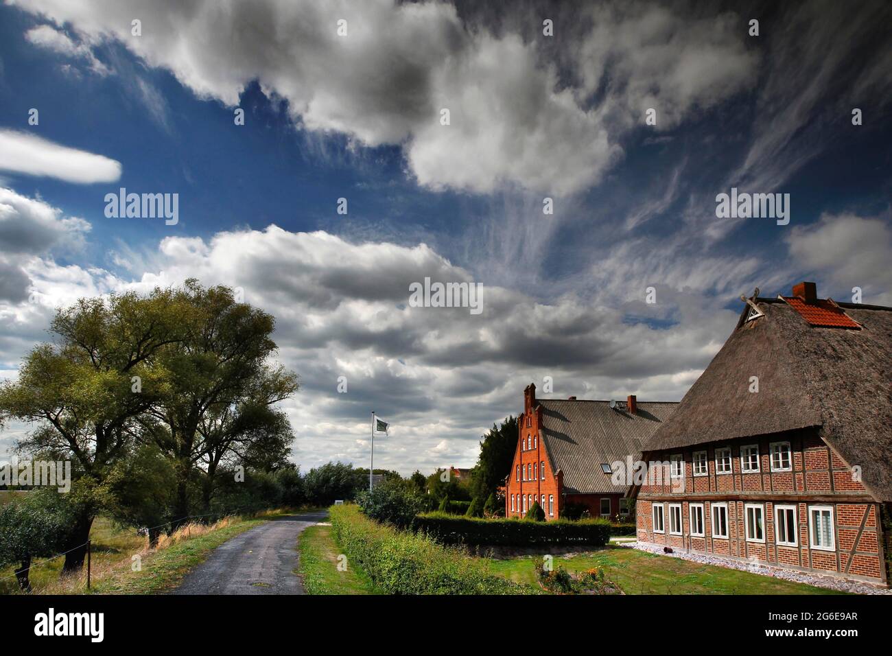 Thatched hall houses in the marshland village of Konau, brick houses ...