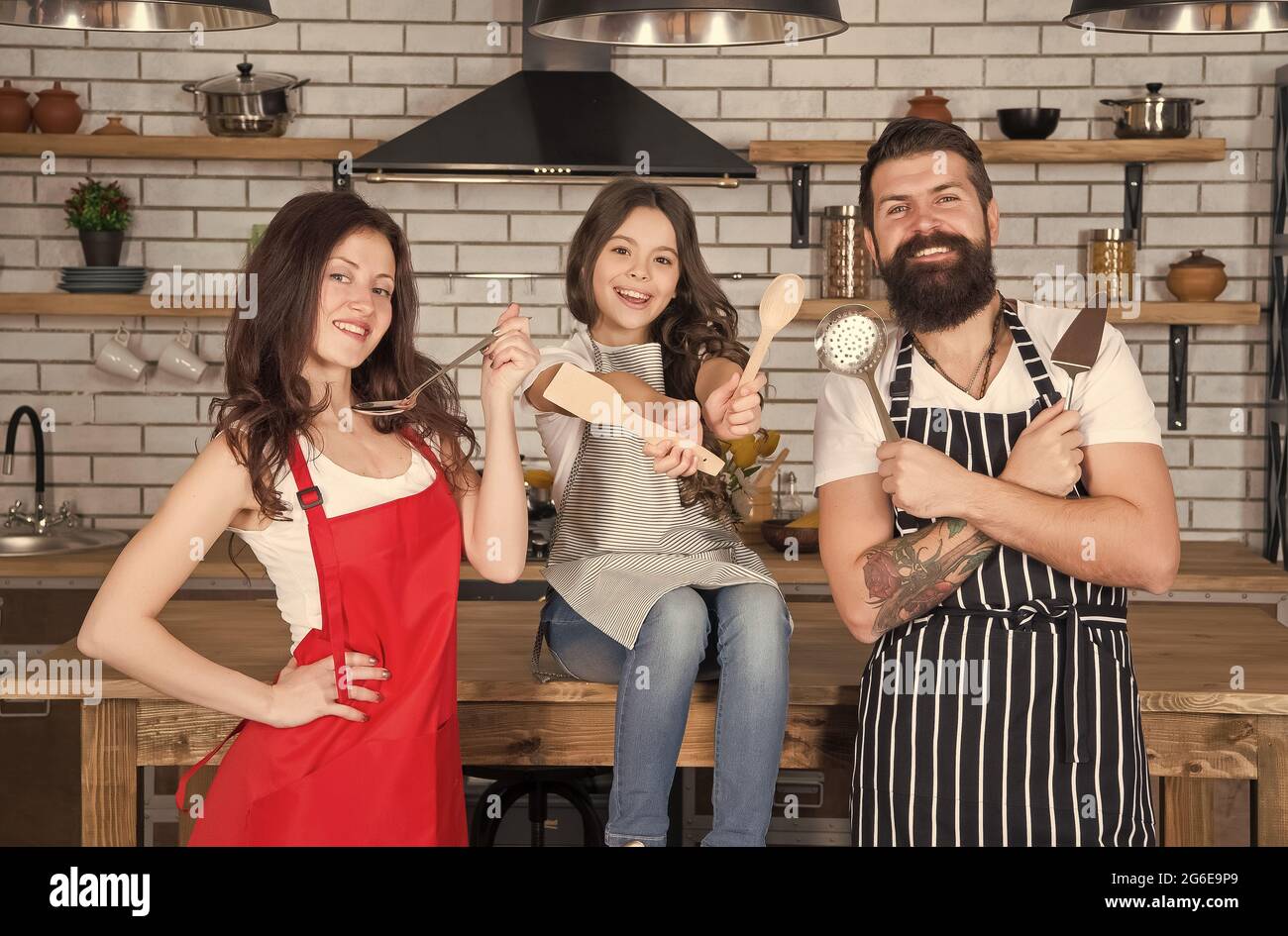 Happy family cooking holiday meals together, culinary recipe concept ...