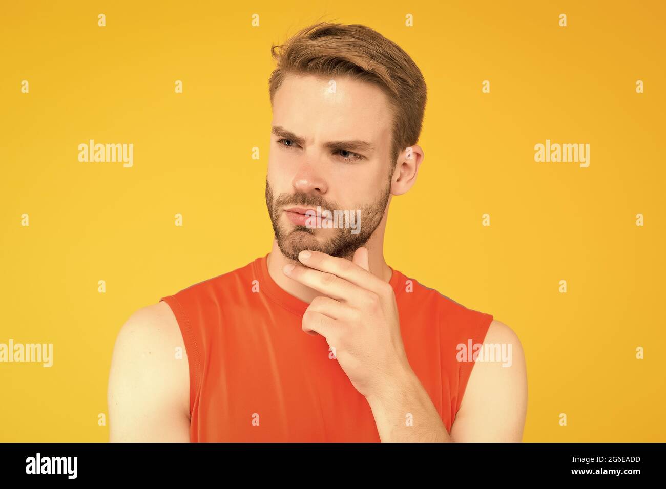 In his own style. serious man with groomed hair. male beauty standard ...