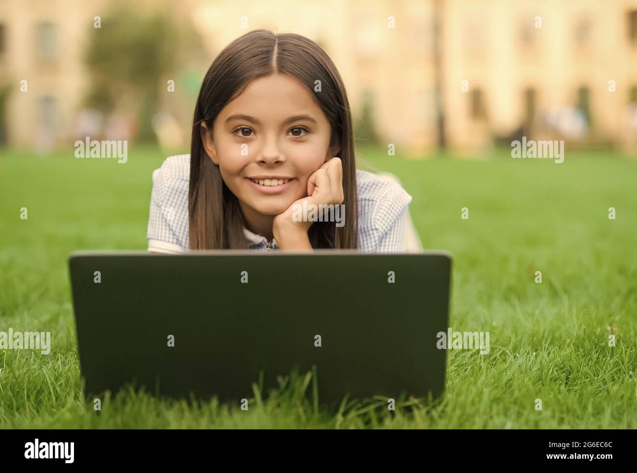 happy kid working on laptop. online education. back to school. teen ...
