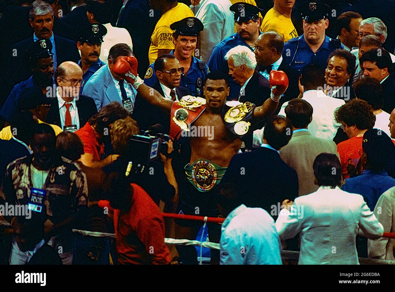 Mike Tyson defeats Michael Spinks in 91 seconds for the Championship at ...
