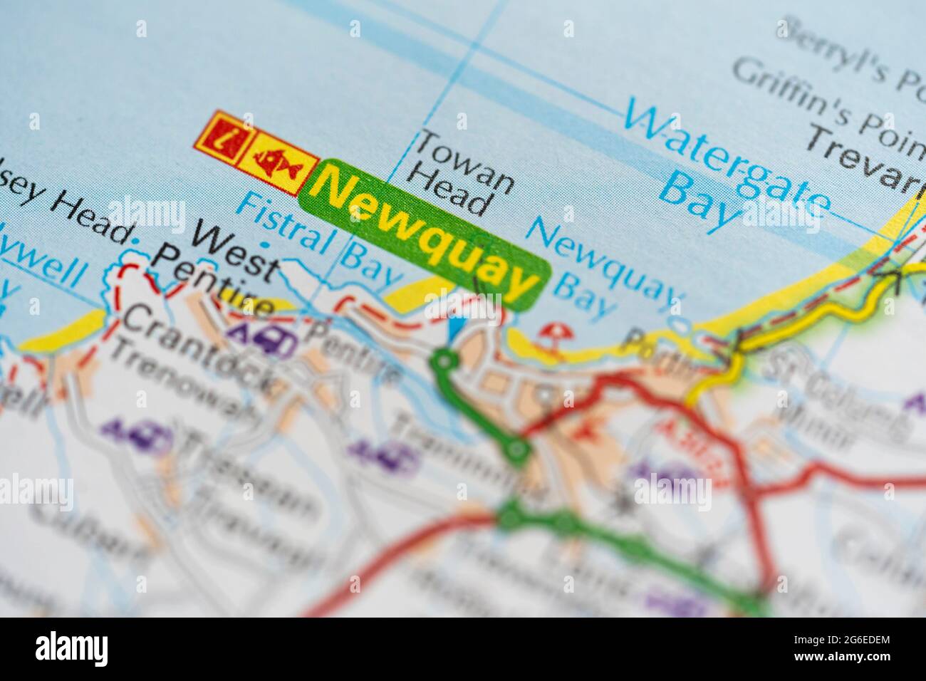 A macro closeup of a page in a printed road map atlas showing the ...