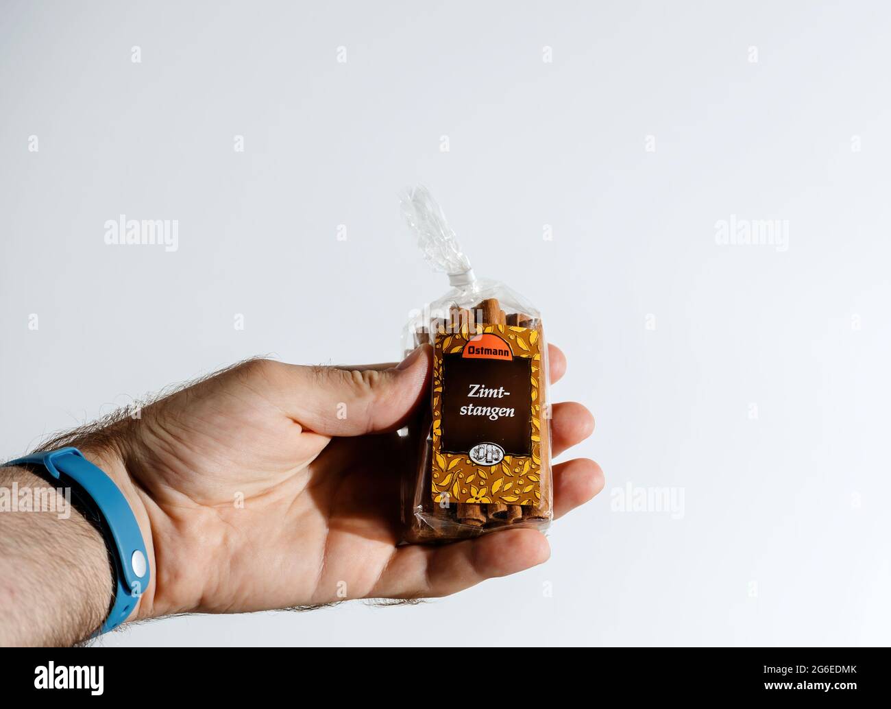 hand holding package with Ostmann cinnamon sticks zimt-stangen Stock ...