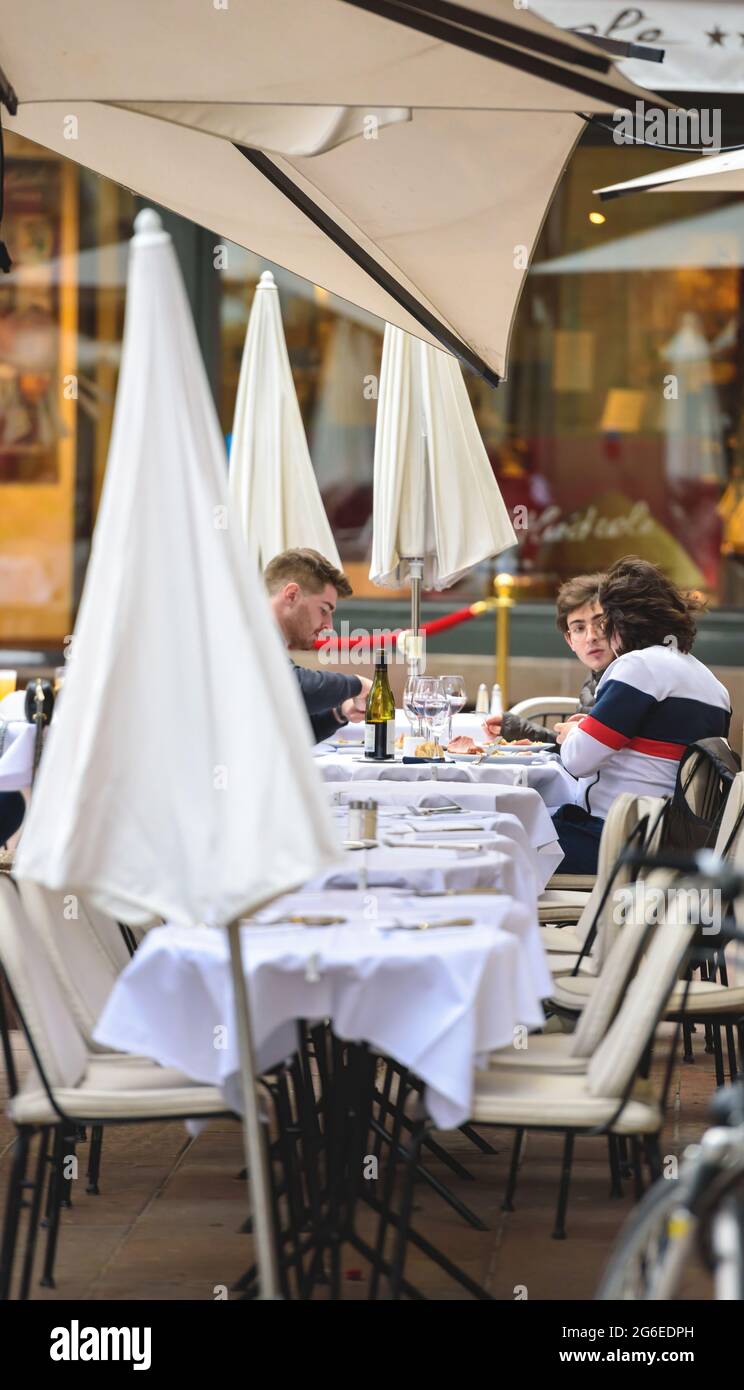 People eating outside at Maison Kammerzell iconic restaurant as bars ...