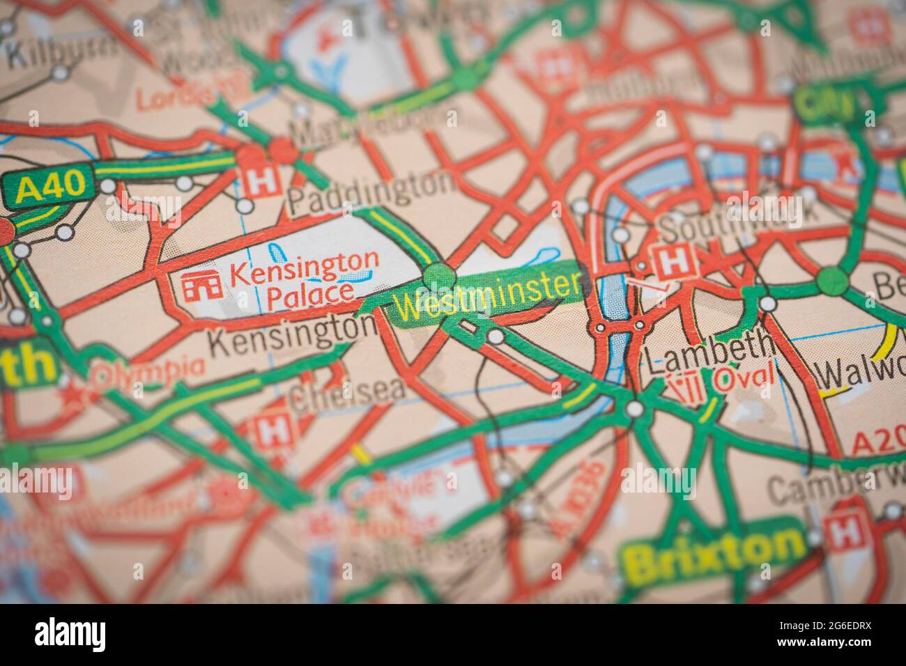 A macro closeup of a page in a printed road map atlas showing the ...