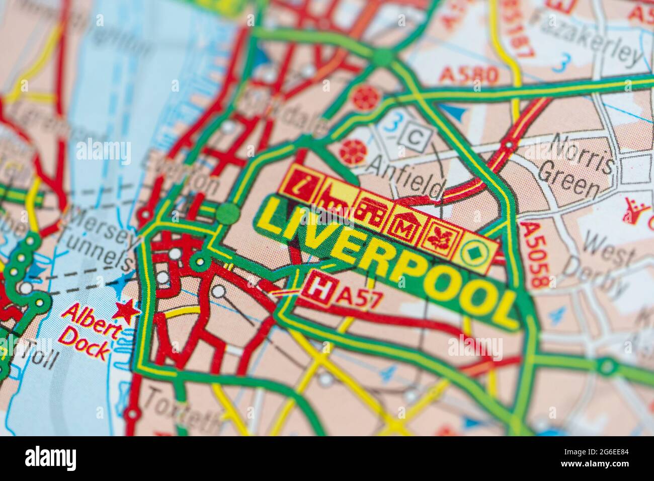 A macro closeup of a page in a printed road map atlas showing the ...