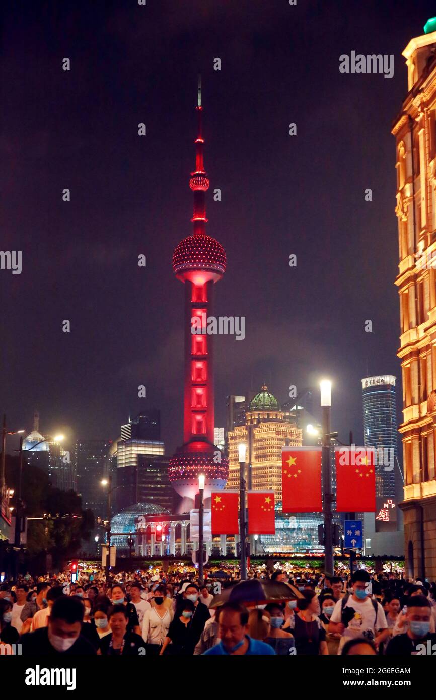 SHANGHAI, CHINA - JULY 3, 2021 - Visitors visit the Shanghai Bund and ...