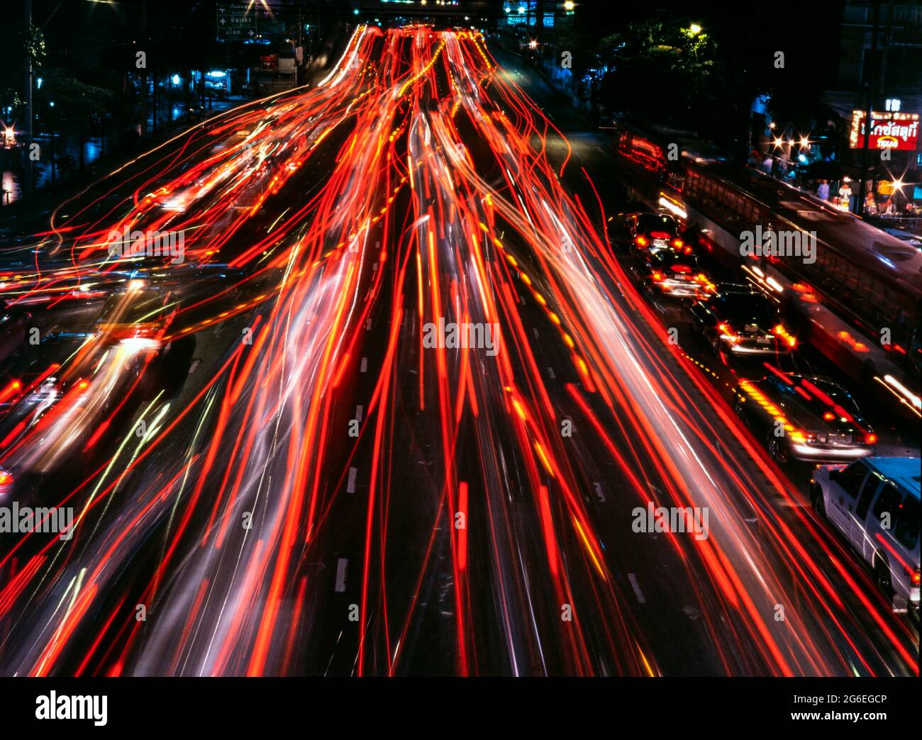 Traffic light trails during traffic jam on Ratchadamri Road, Bangkok ...