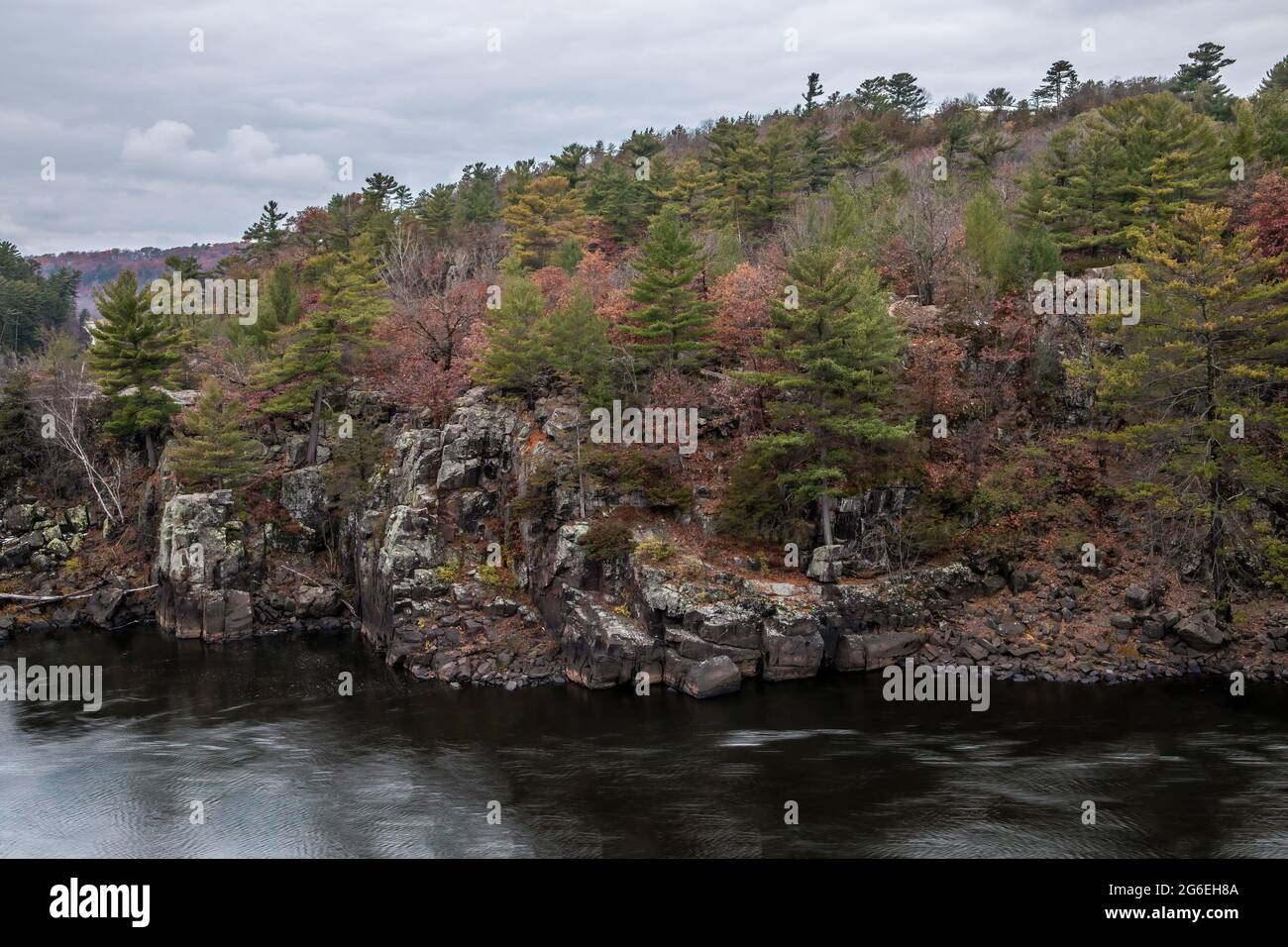 Igneous rock cliffs formed from the Ice Age in the St. Croix River at ...