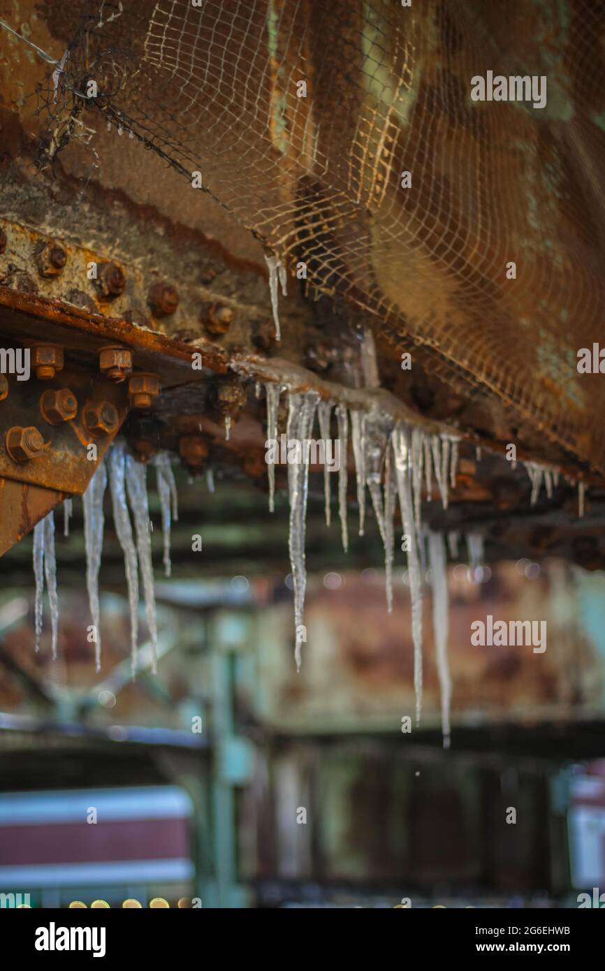 ice hanging from steel beams Stock Photo - Alamy
