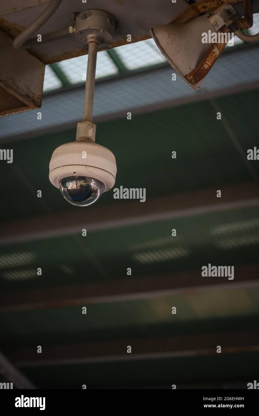 Hanging public camera Stock Photo - Alamy