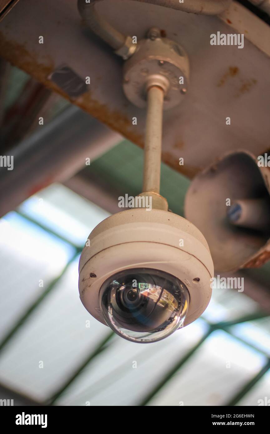 Hanging public camera Stock Photo - Alamy