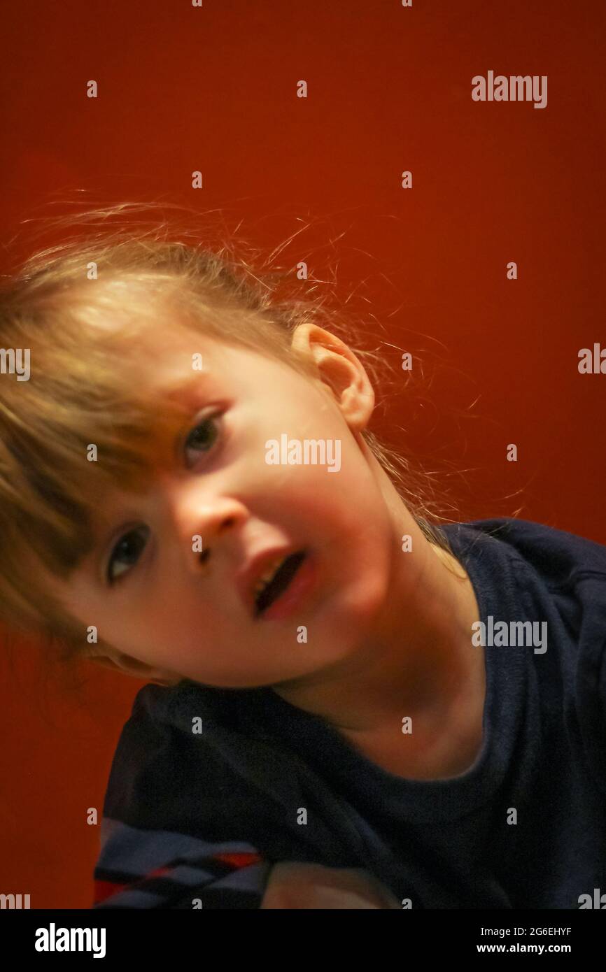 baby boy with red background Stock Photo - Alamy