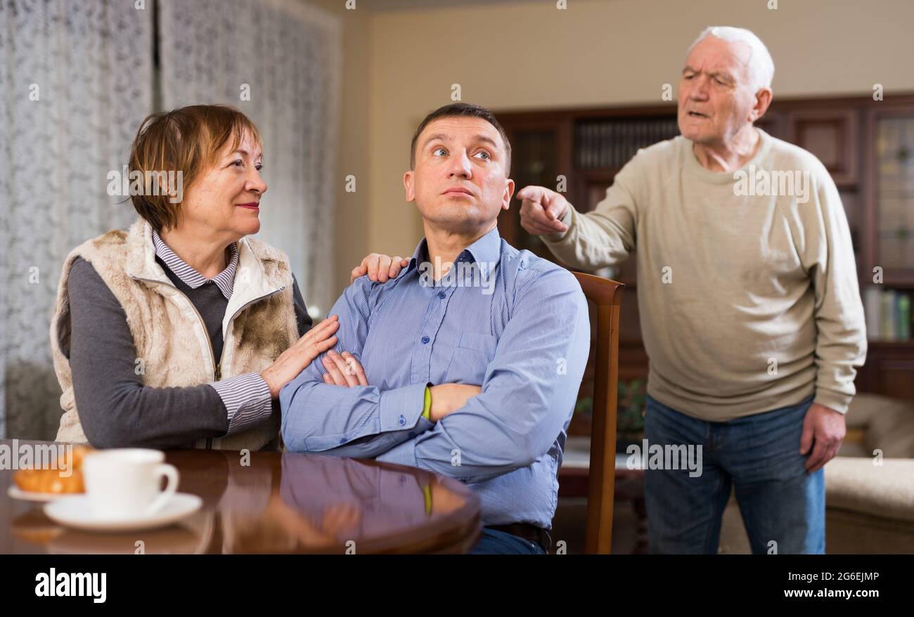 Adult son arguing with parents hi-res stock photography and images - Alamy