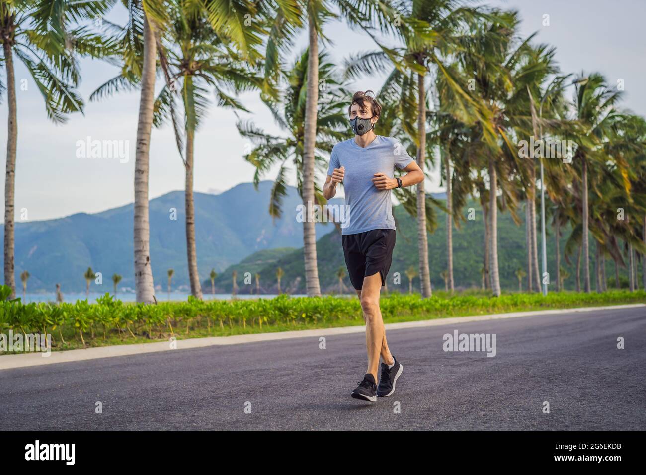 Runner wearing medical mask, Coronavirus pandemic Covid-19. Sport ...