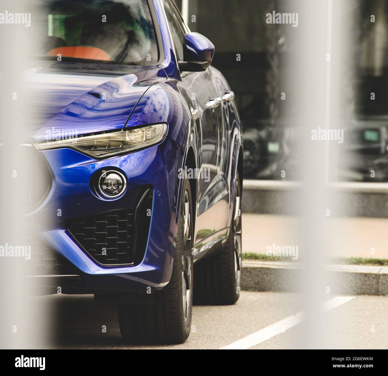 Abstract photo of a car. Part of a blue car. Luxury car Stock Photo - Alamy
