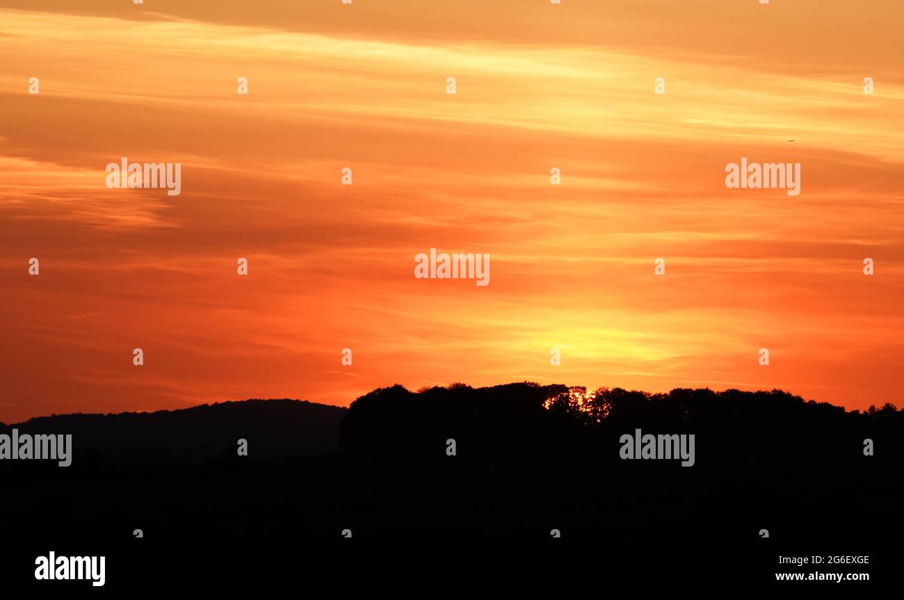 Sunset close-up with vivid red and orange colours Stock Photo - Alamy