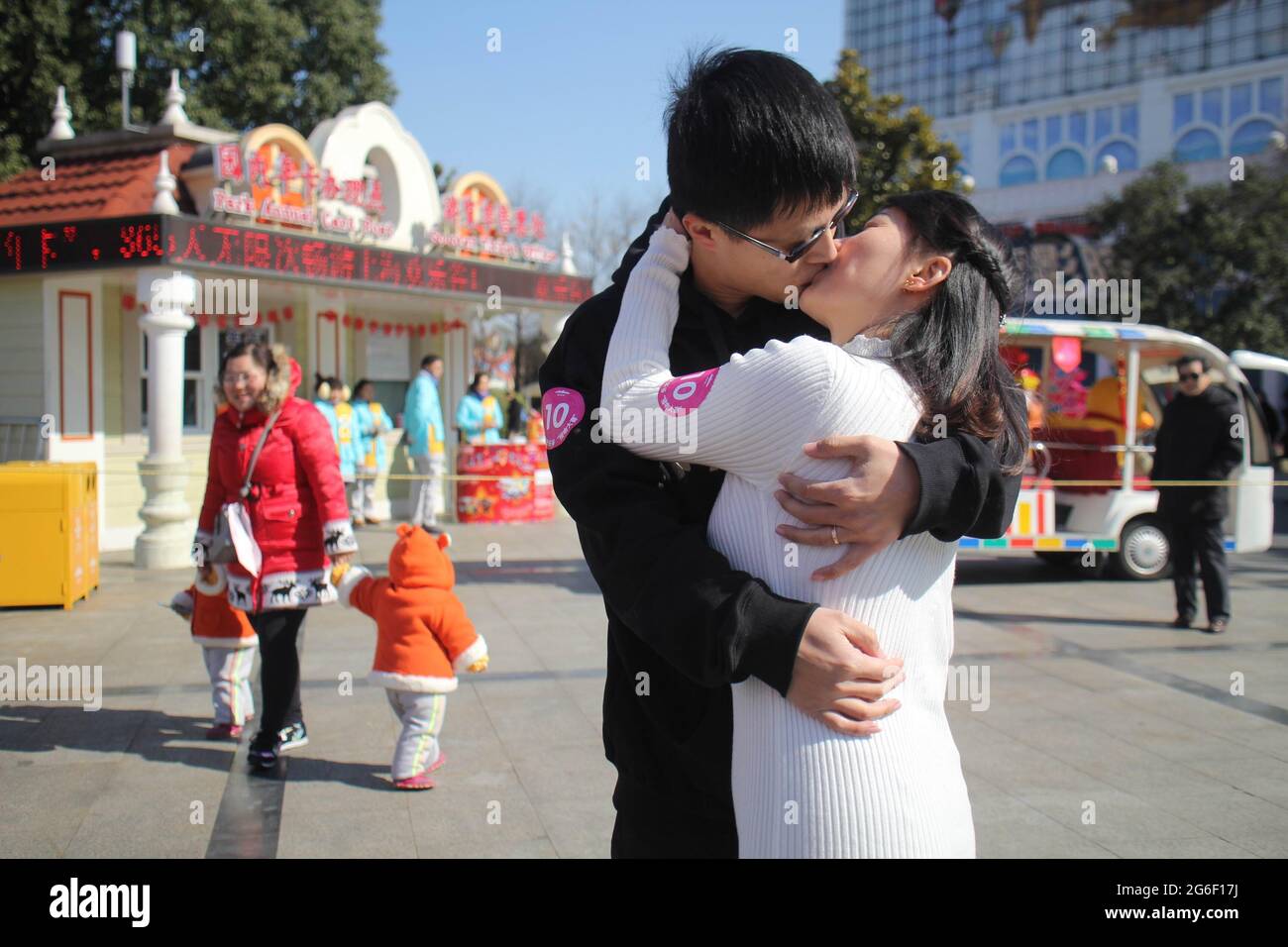 SHANGHAI, CHINA - FEBRUARY 11, 2017 - Couples and families take part in ...