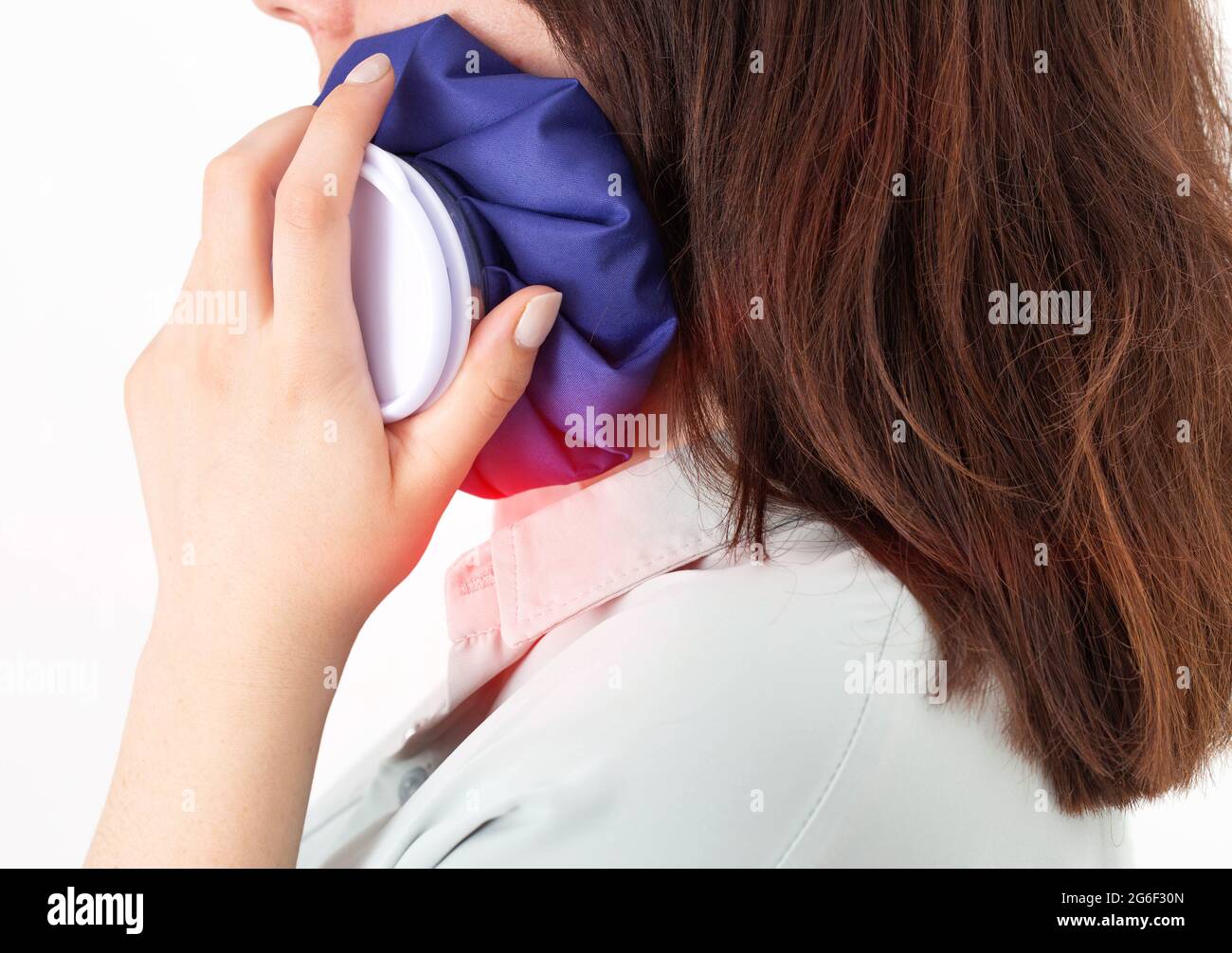 The girl attaches a medical bag with cold to the inflamed salivary ...