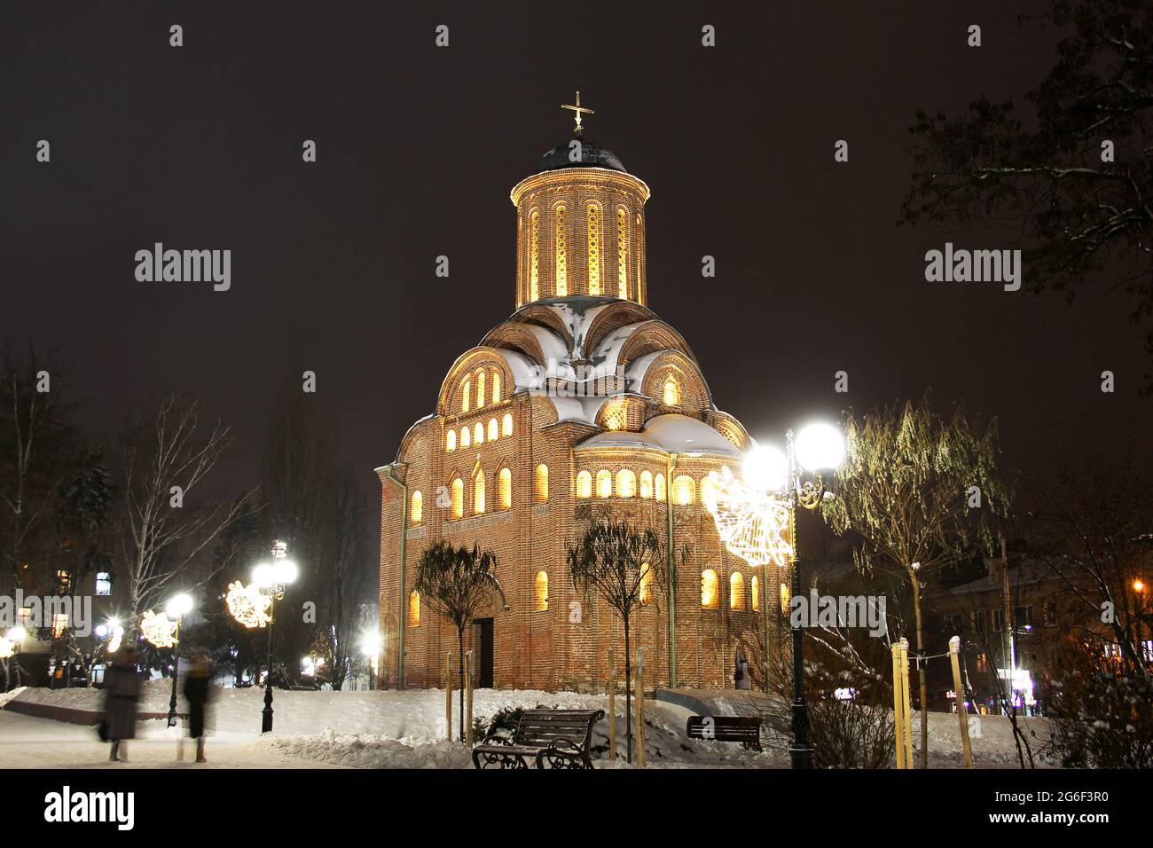 Church in the winter. Night city Stock Photo - Alamy