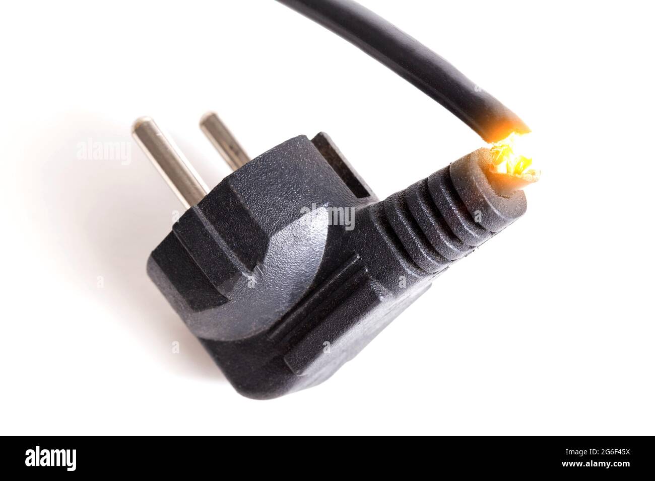 Broken electrical wire with a plug for an outlet on a white background ...