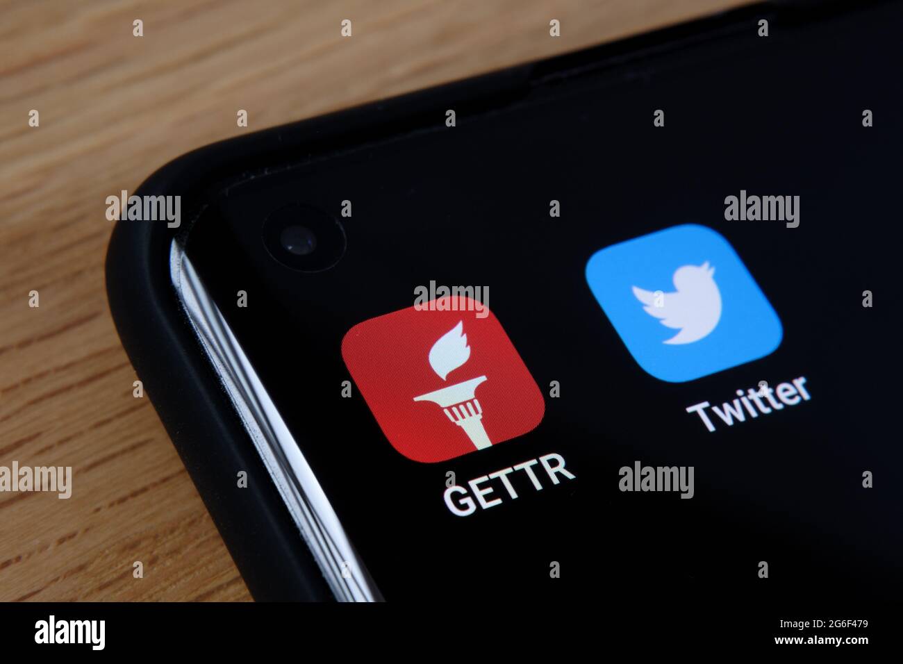 GETTR and Twitter social media apps seen on the corner of smartphone ...