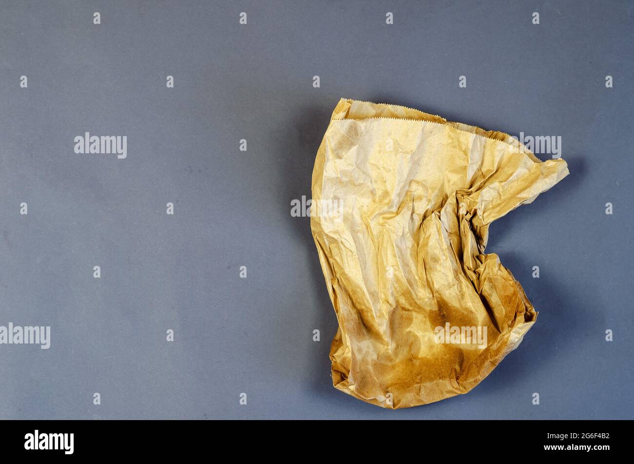 Dirty brown paper bag on a gray background. Paper bag used for packing ...