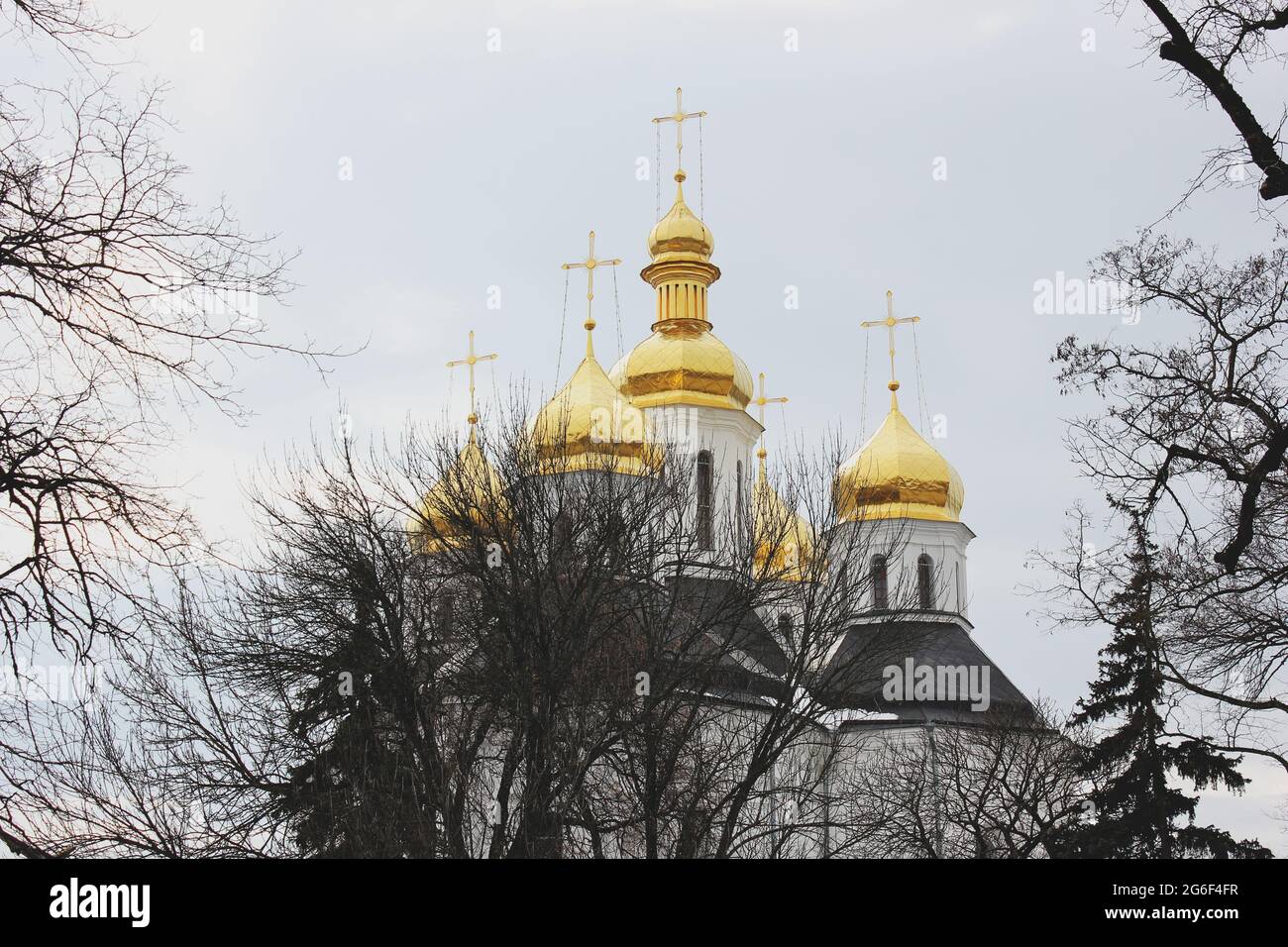 Beautiful church in the city. Golden domes Stock Photo - Alamy