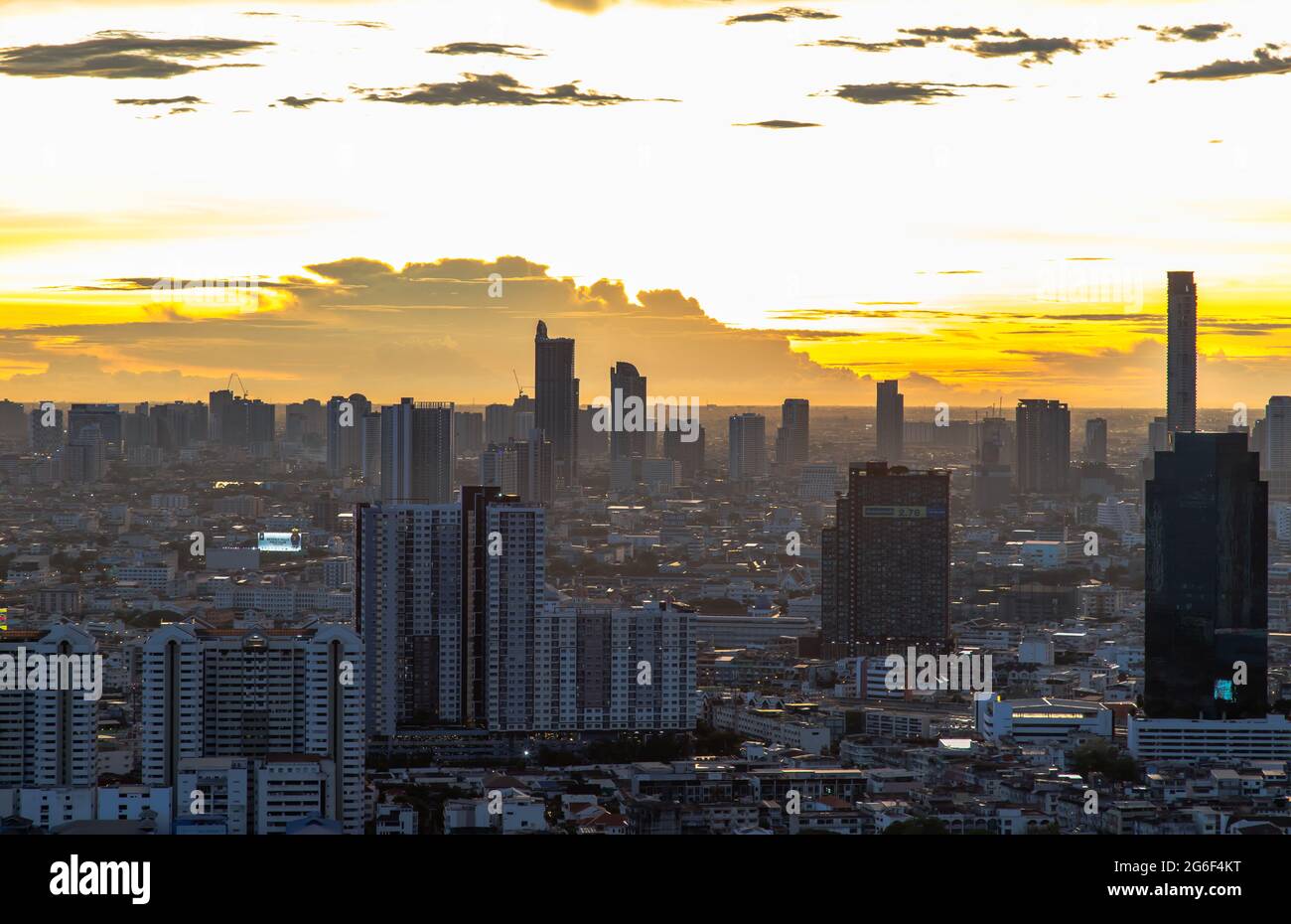 Aerial view of Beautiful sunset over large metropol city in Asia. With ...