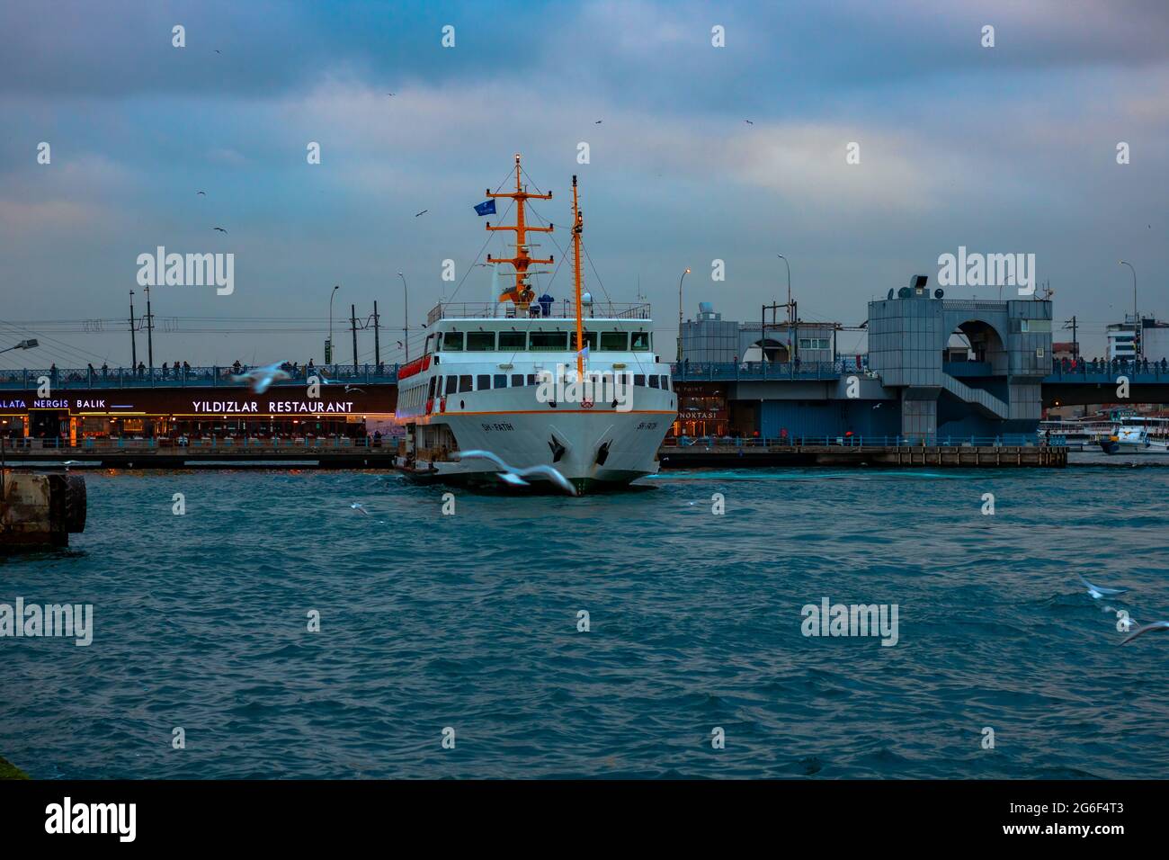 Istanbul's famous ferries near the pier in Eminonu district Stock Photo ...
