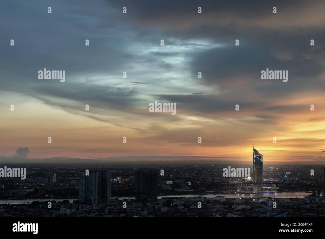 Aerial view of Beautiful sunset over large metropol city in Asia. There ...