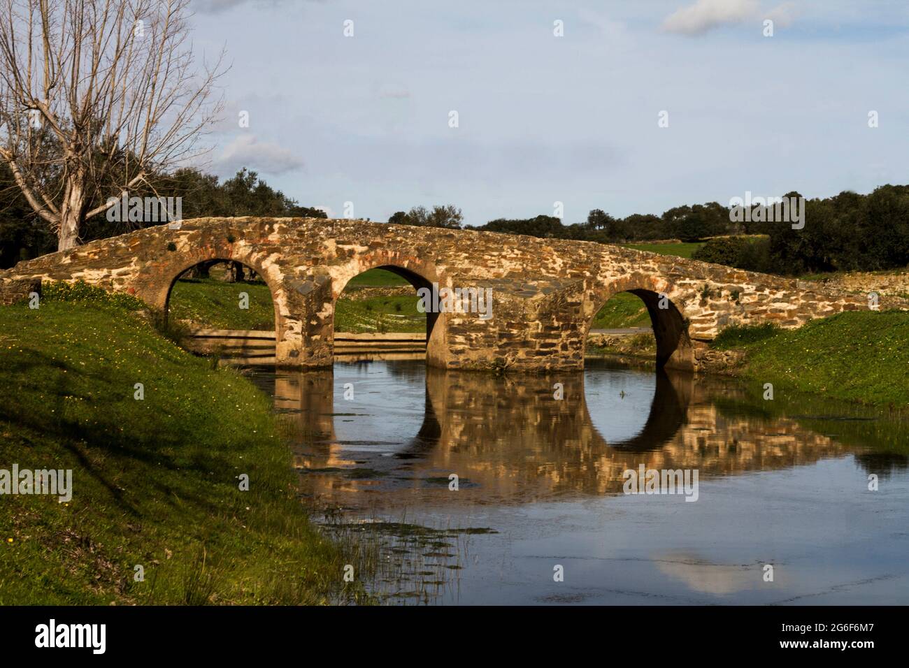 View of an ancient roman bridge located in Almodovar, Portugal Stock ...