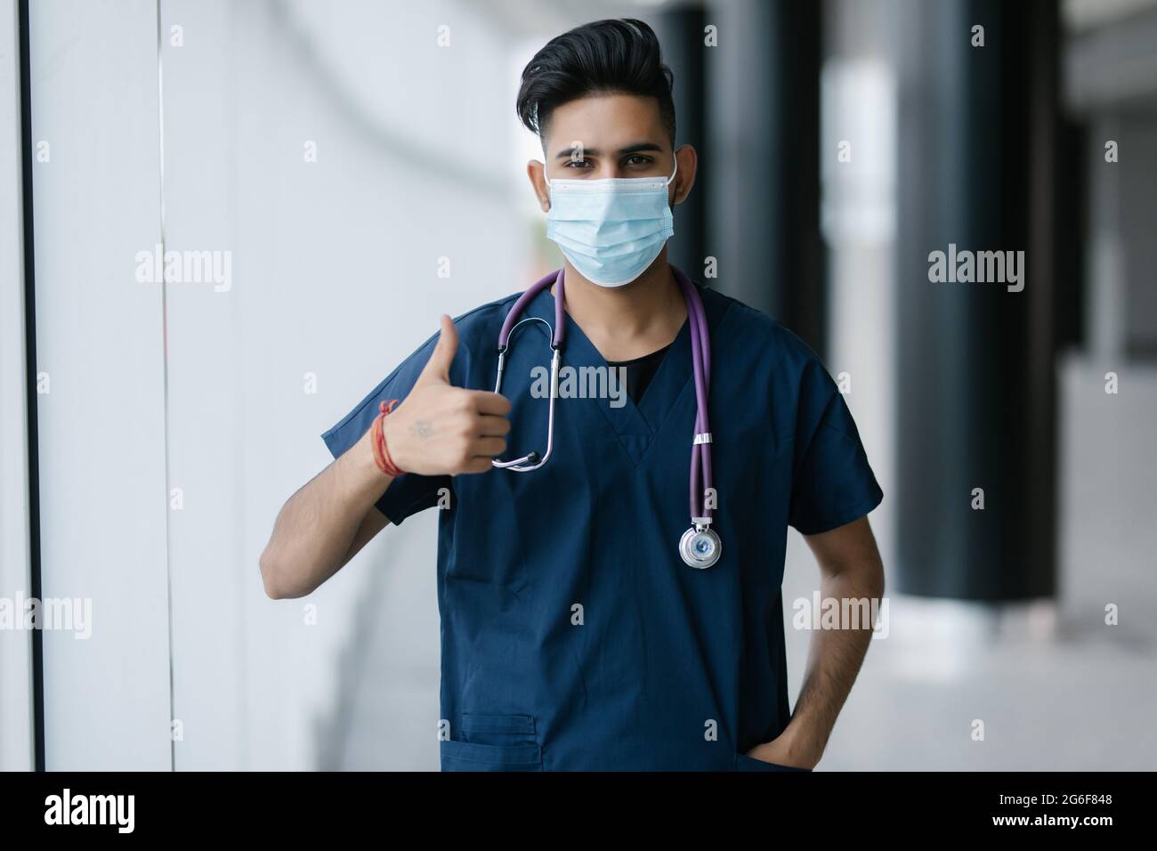 Young indian doctor mask hi-res stock photography and images - Alamy