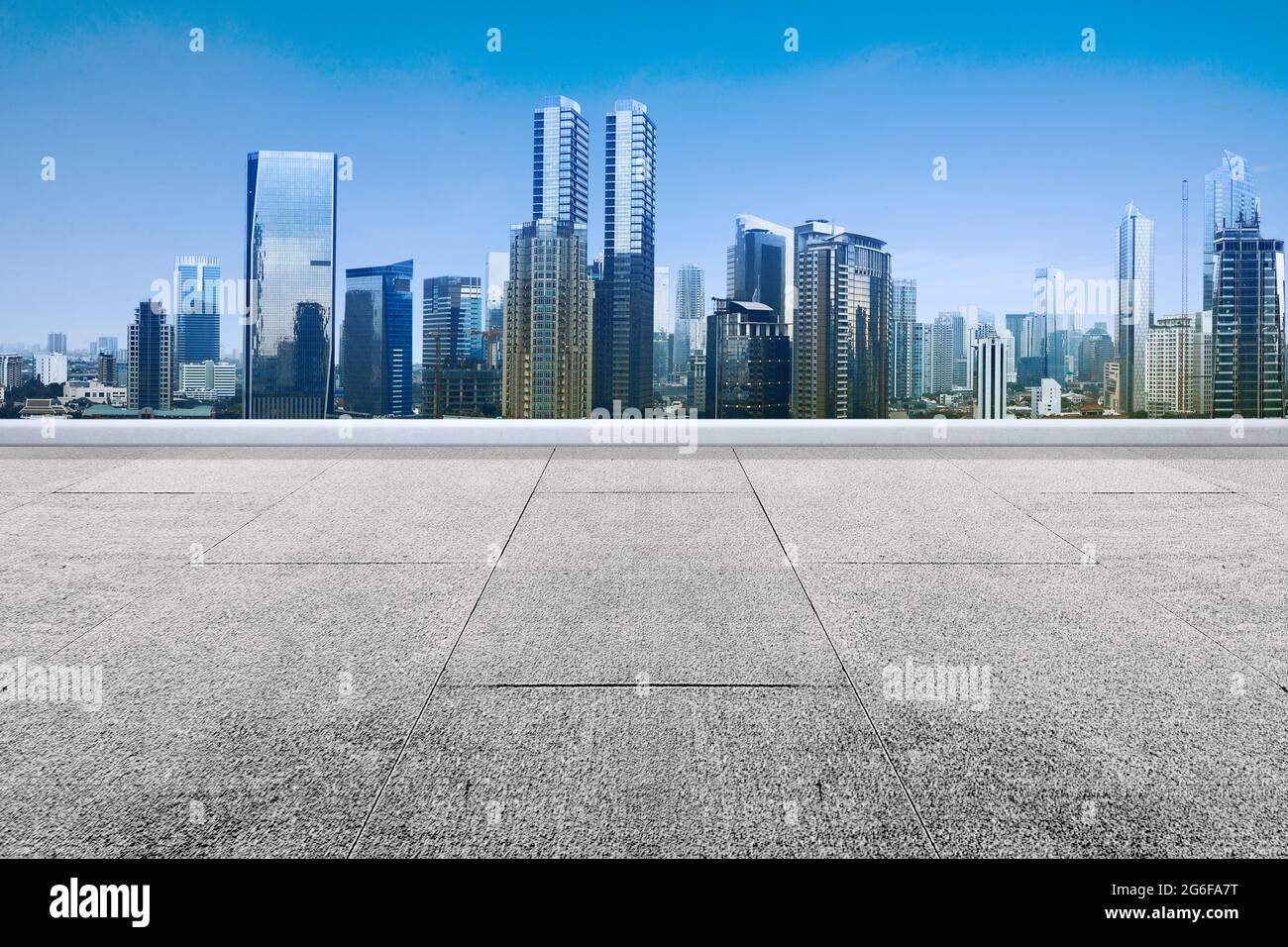 Rooftop view with modern cityscapes and blue sky background Stock Photo ...