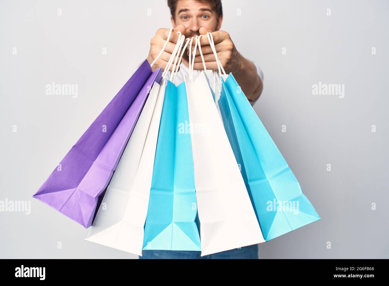 Man holding lot packages hi-res stock photography and images - Alamy