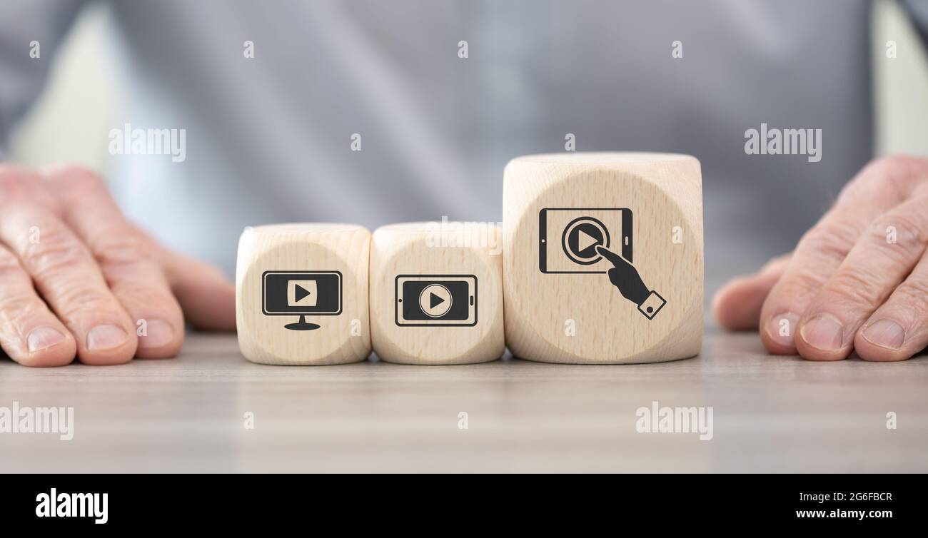 Wooden blocks with symbol of online streaming concept Stock Photo - Alamy