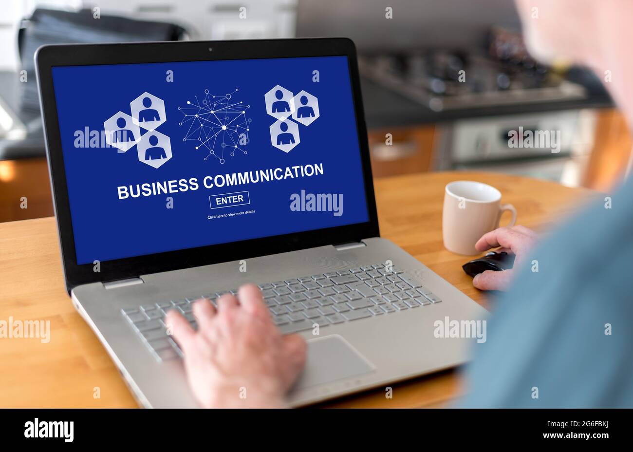 Man using a laptop with business communication concept on the screen ...